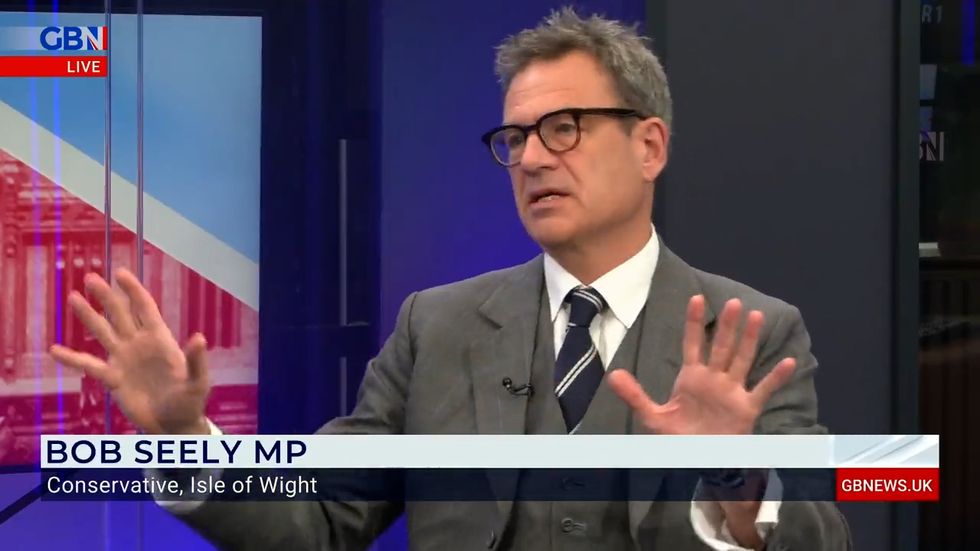 Huge Tory rebellion forces Sunak to back down over massive housing ...