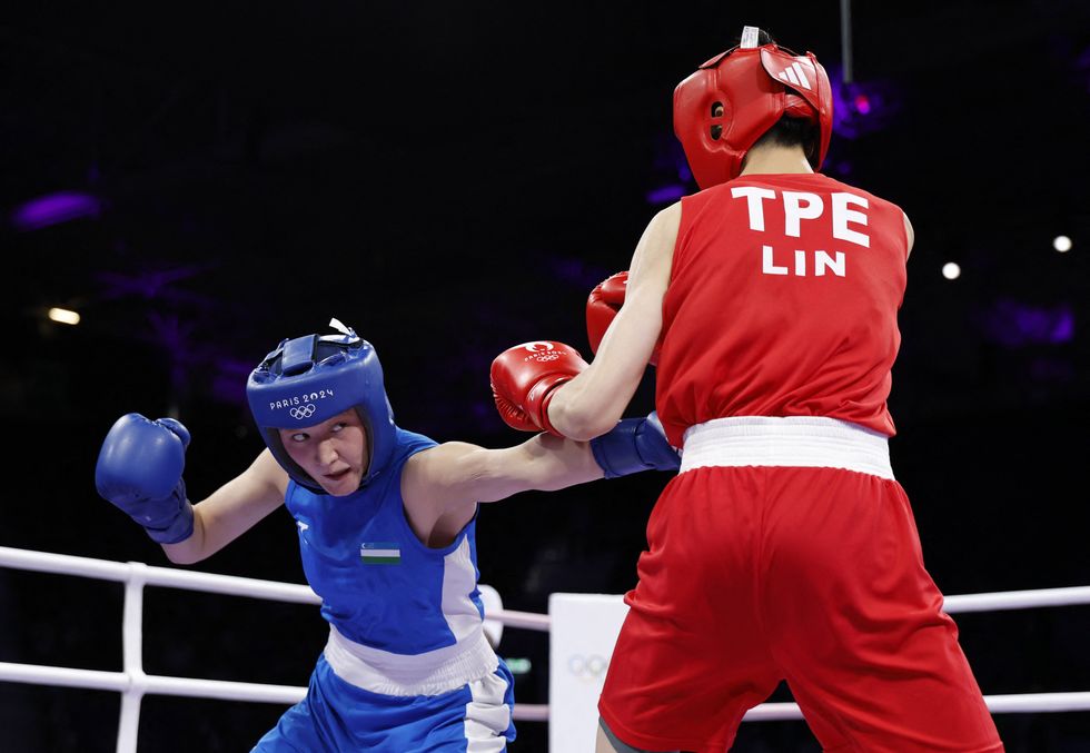 Olympics: Female boxers who 'failed gender test' one win away from ...