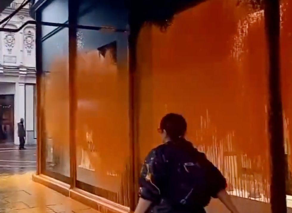 Just Stop Oil activists spray Harrods with orange paint as protests ...