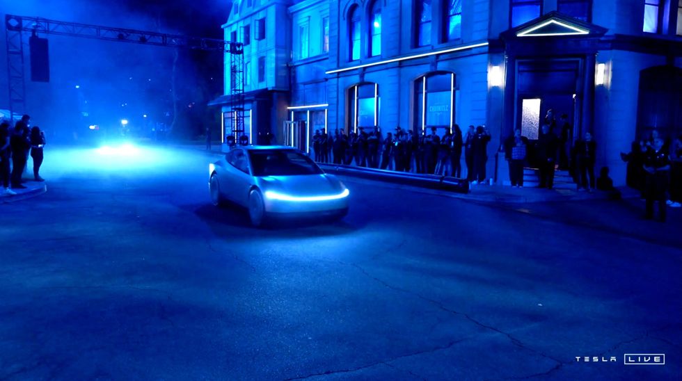 Elon Musk unveils Tesla Cybercab without steering wheel and Optimus ... Elon Musk unveils Tesla Cybercab without steering wheel and Optimus ...