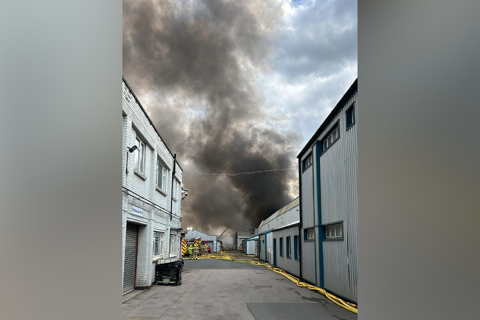 Birmingham fire: Flames engulf factory near M6 as huge plume of smoke seen for miles across ...